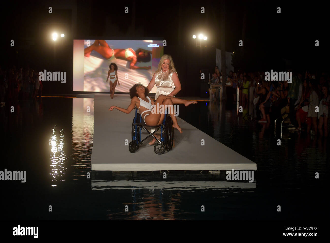 Miami Beach, Florida, USA. 14th July 2019. Model walks the runway ...