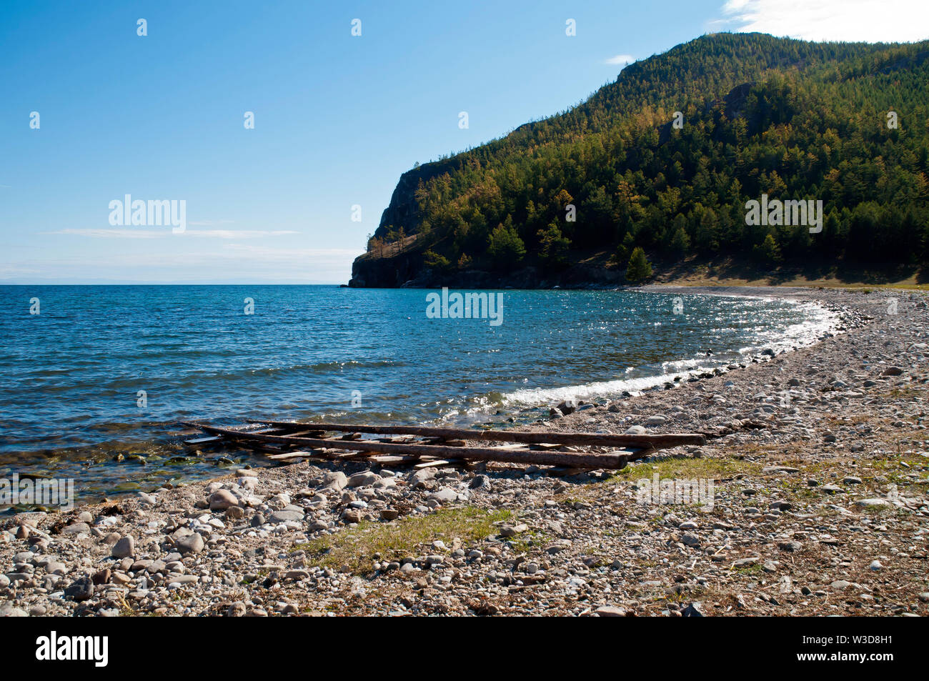 Olkhon Island Russia, pebble beach with a basic wooden boat ramp on ...
