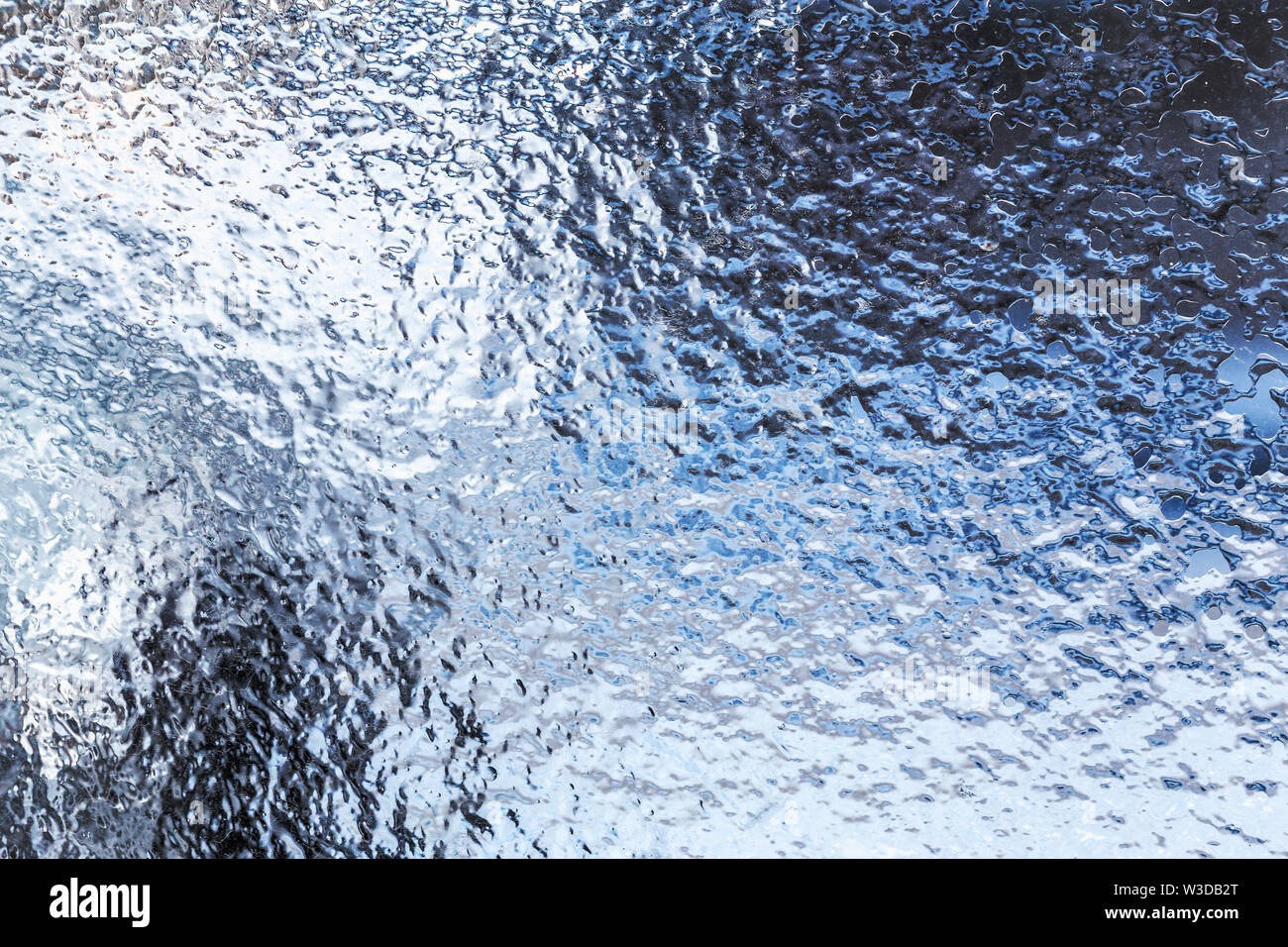 Frozen ice pattern on glass Stock Photo - Alamy
