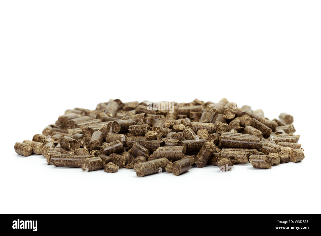stack of wooden pellets for bio energy, white background, isolated ...