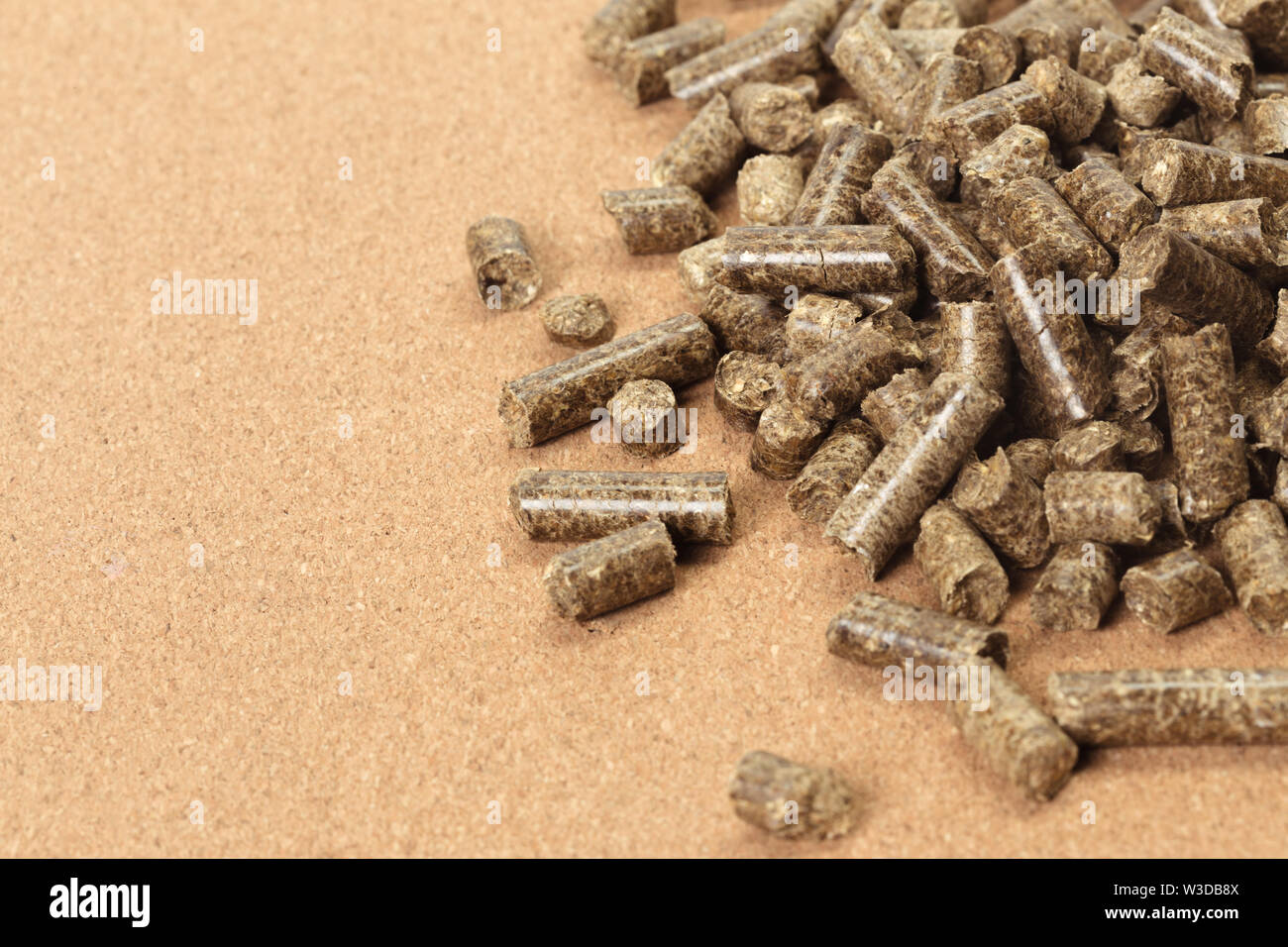 Resource. Pellets on the table Stock Photo - Alamy