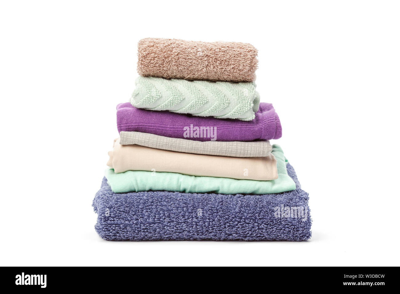 stack of clothing isolated on white Stock Photo - Alamy