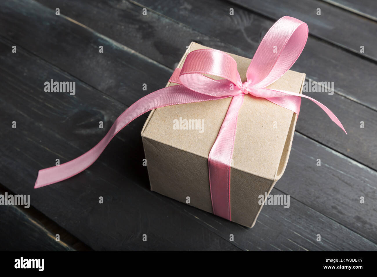 Gift box with ribbon Stock Photo - Alamy