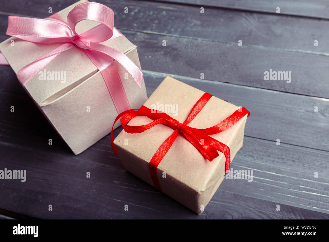 Gift box with ribbon Stock Photo - Alamy