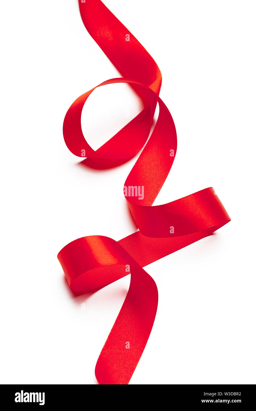 Red ribbon on white background Stock Photo - Alamy
