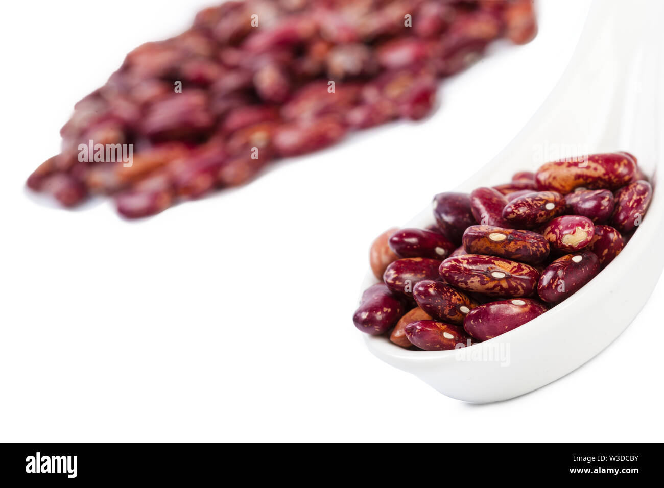 Red beans isolated on white background Stock Photo - Alamy