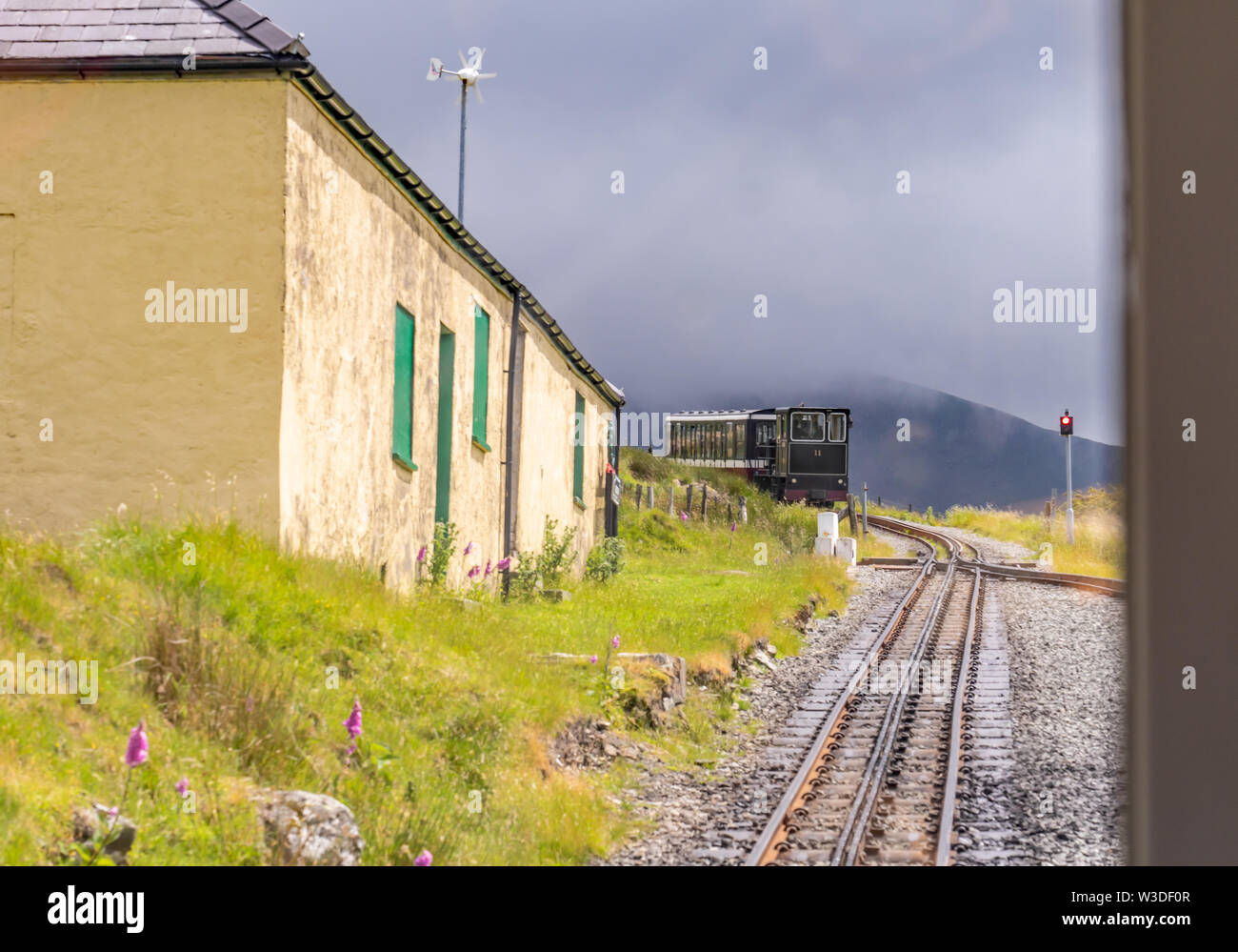Steam train arriving at Halfway House junction on its inward bound ...