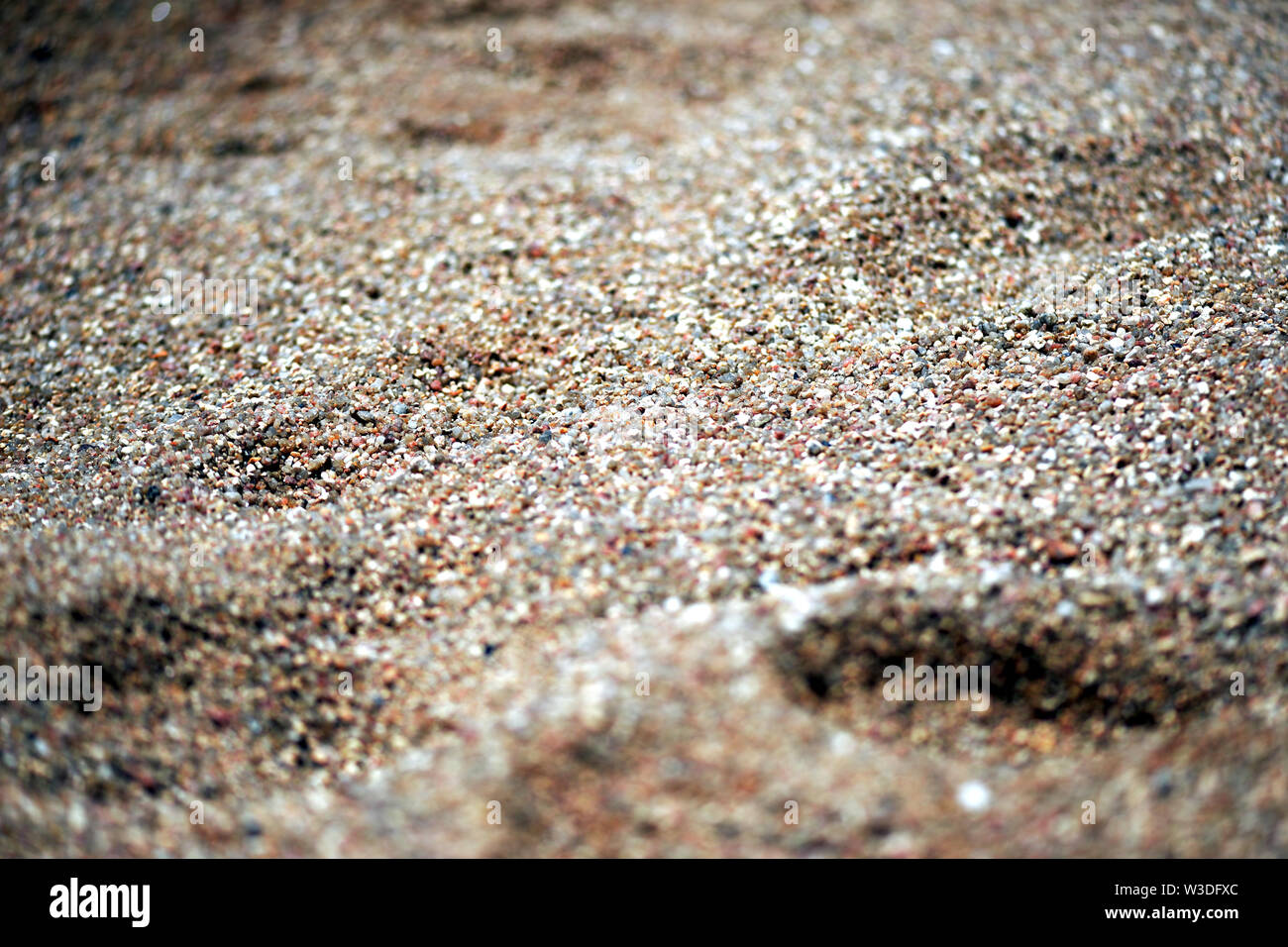 Sea coast sand texture close up. Natural background Stock Photo - Alamy