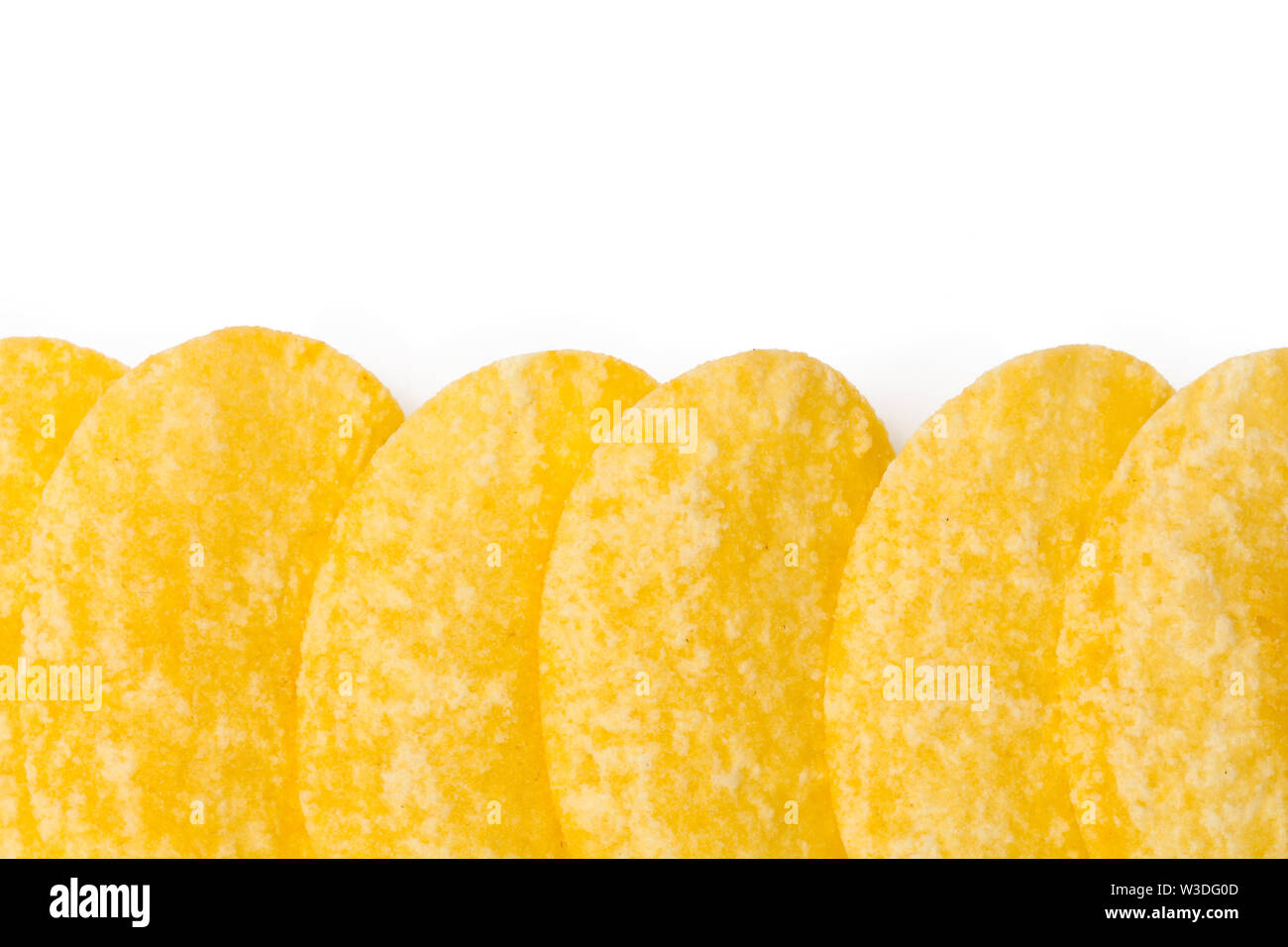 yellow potato chips isolated on white Stock Photo - Alamy