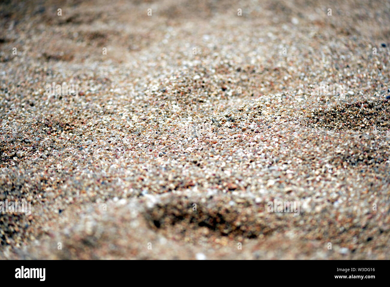 Sea coast sand texture close up. Natural background Stock Photo - Alamy