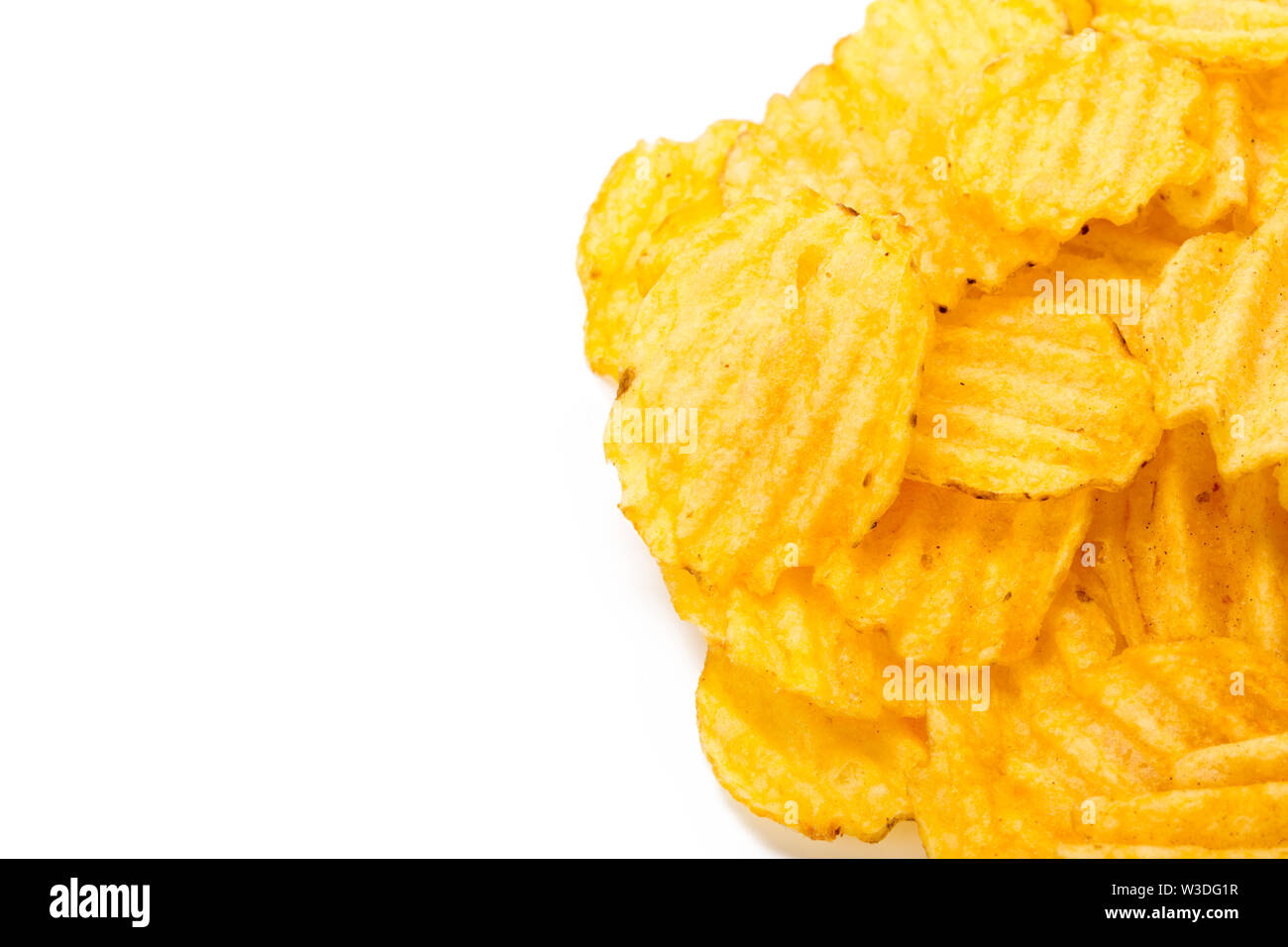 yellow potato chips isolated on white Stock Photo - Alamy