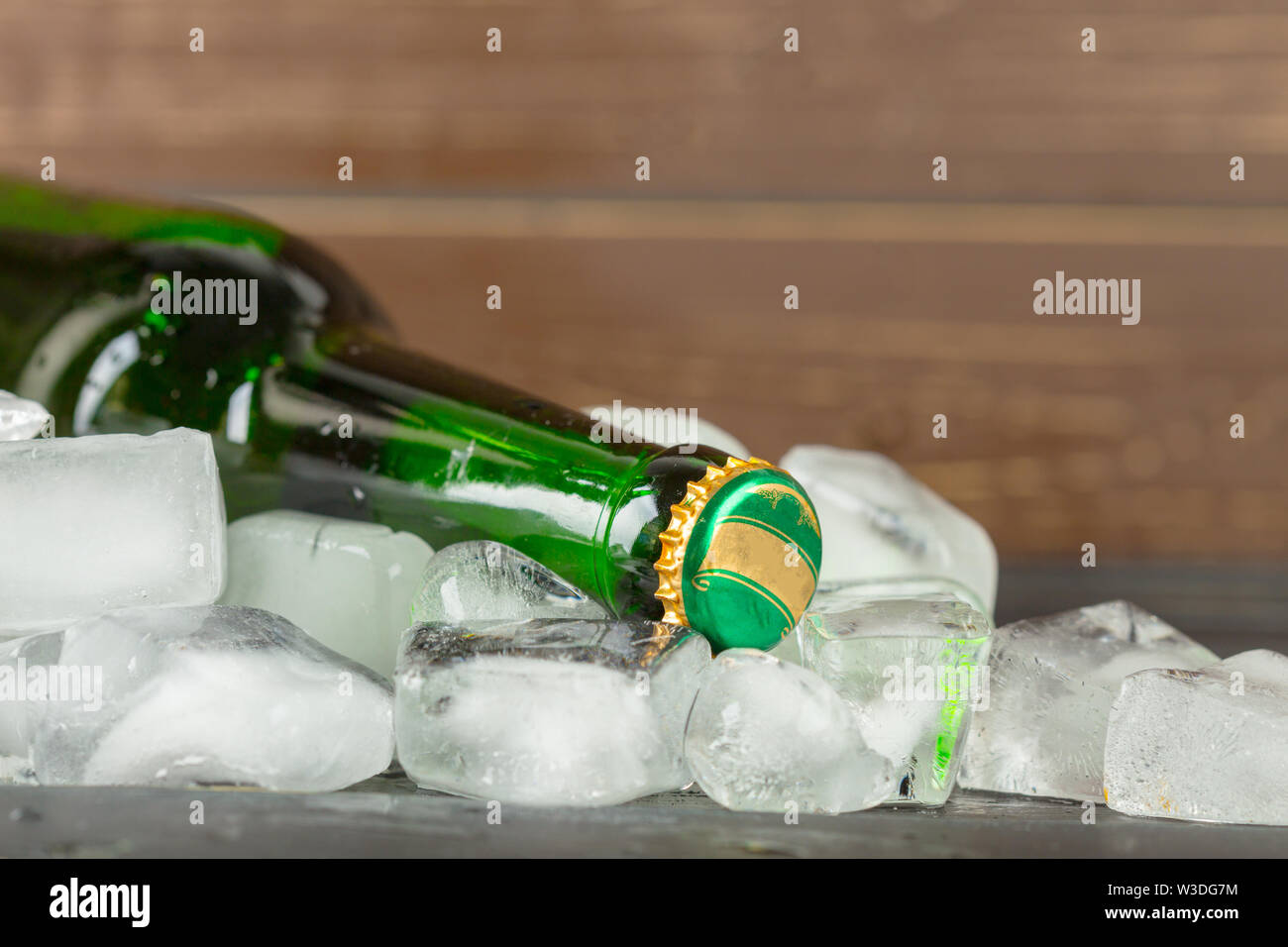 Bottles of cold and fresh beer with ice Stock Photo - Alamy