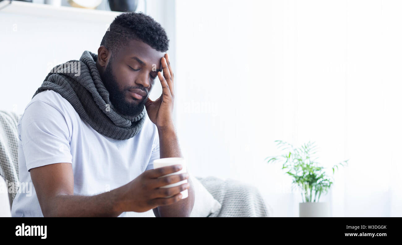 Sick man holding cup hi-res stock photography and images - Alamy