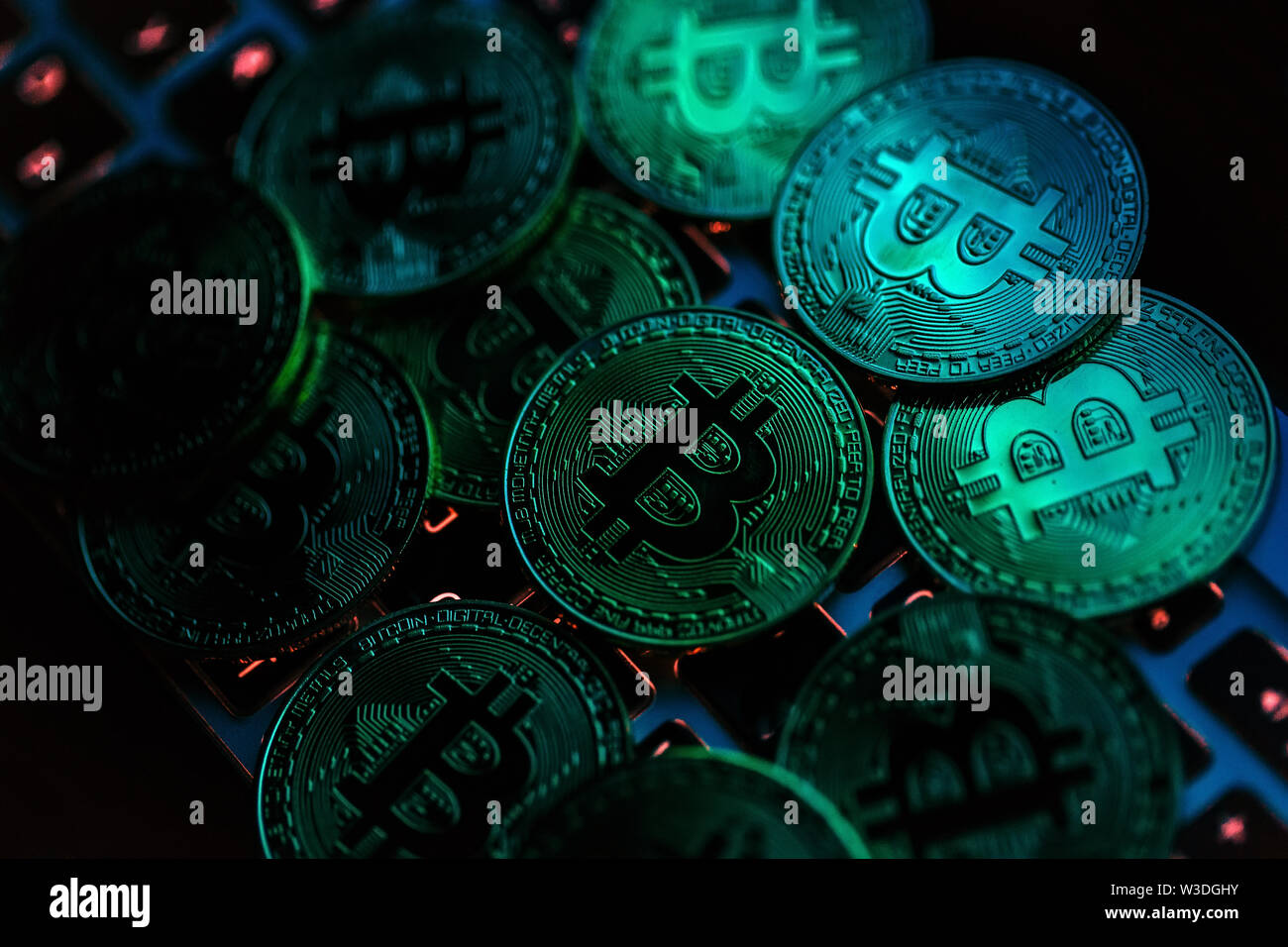 Bitcoin coins on laptop keyboard. Cryptocurrency Stock Photo - Alamy