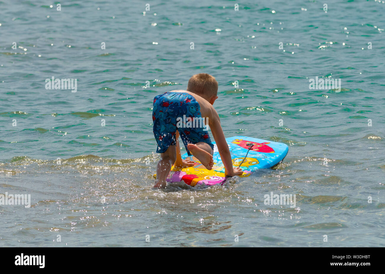Bodyboarding boy hi-res stock photography and images - Alamy