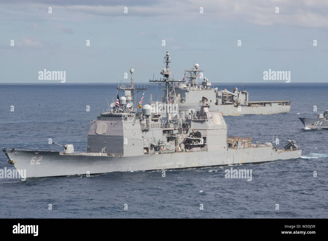 Ships of Expeditionary Strike Group 7 transit through the Tasman Sea in ...
