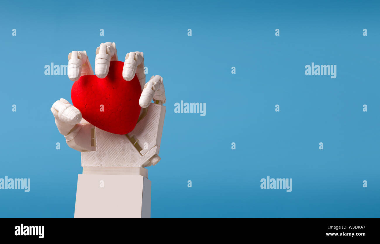 Robot hand holding hi-res stock photography and images - Alamy