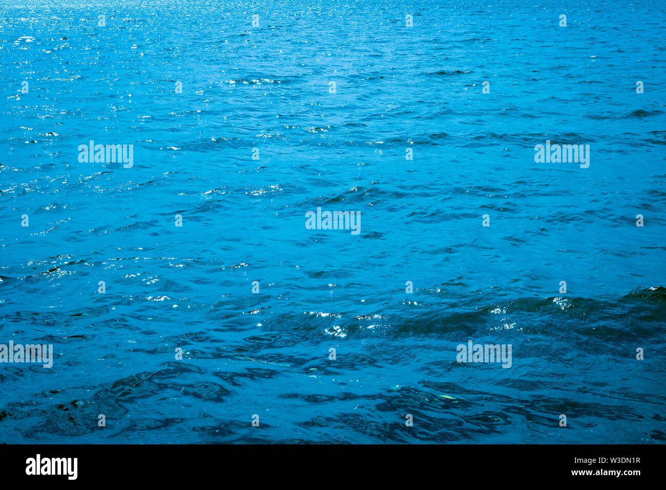 Blue azure water in the sea. Waves on the surface of the water ...