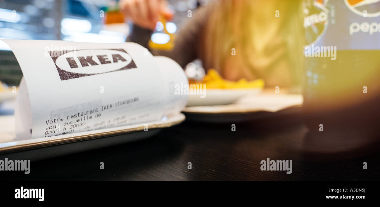 Strasbourg, France - Circa 2019: IKEA paper receipt as woman eats ...