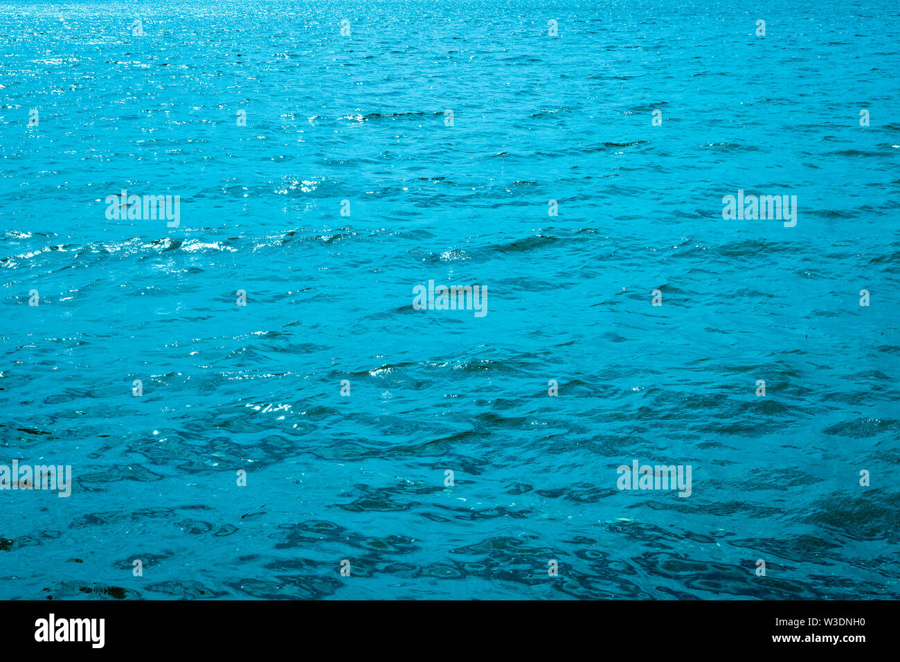 Blue azure water in the sea. Waves on the surface of the water ...