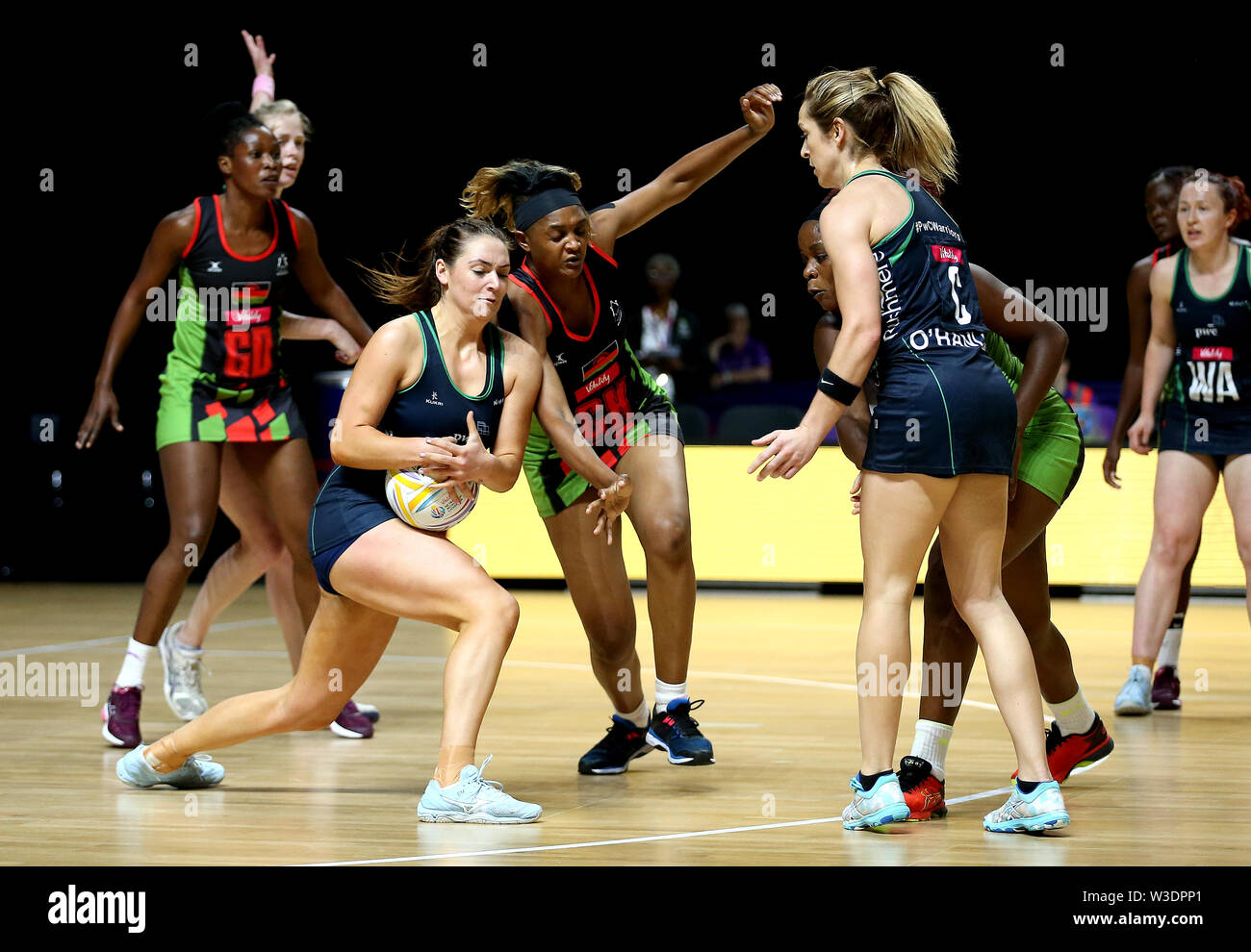 Northern Ireland's Emma Magee (left) in action during the Netball World ...