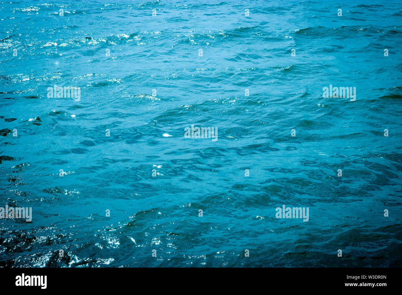 Blue azure water in the sea. Waves on the surface of the water ...