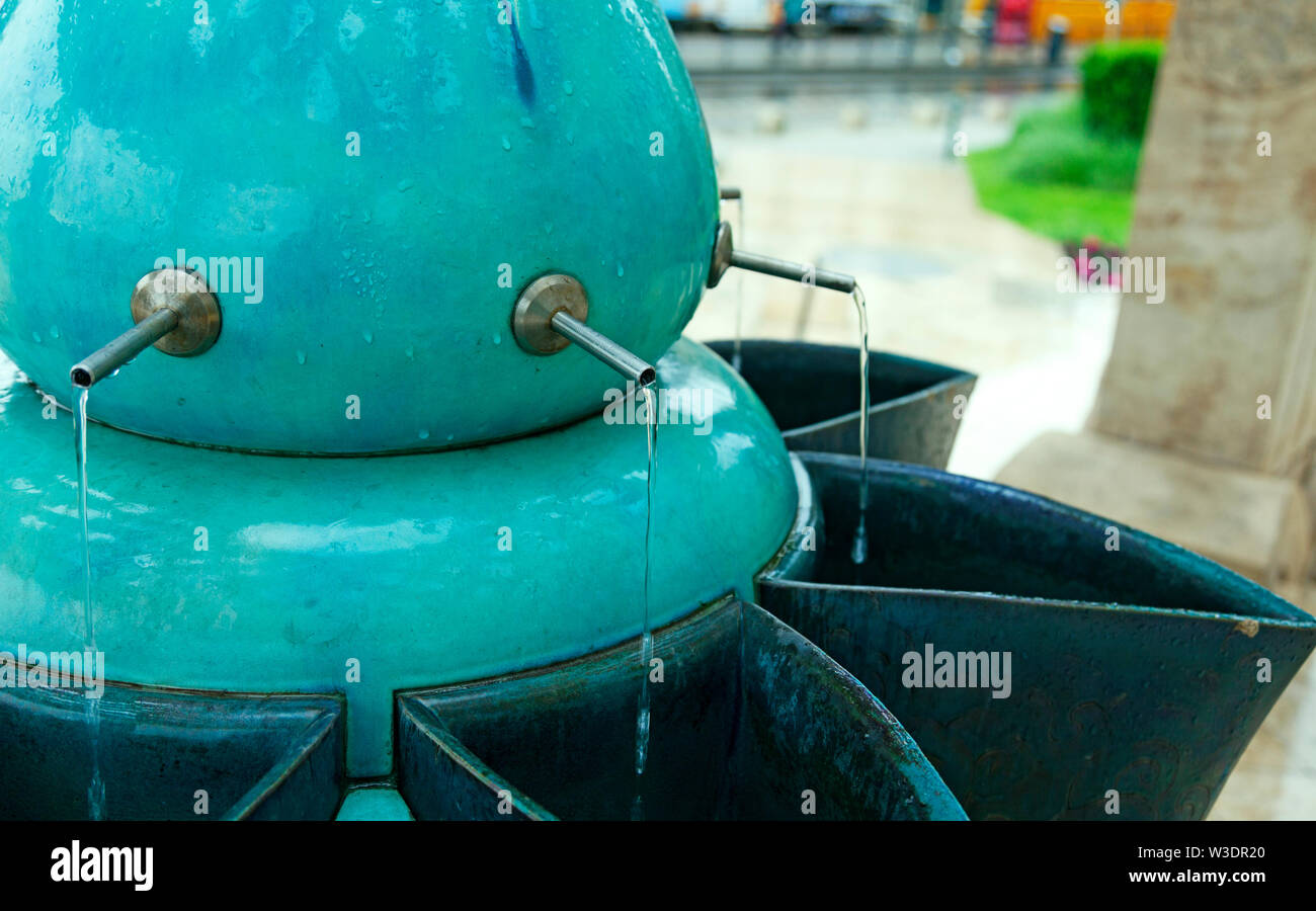 Turquoise drinking fountain in hi-res stock photography and images - Alamy