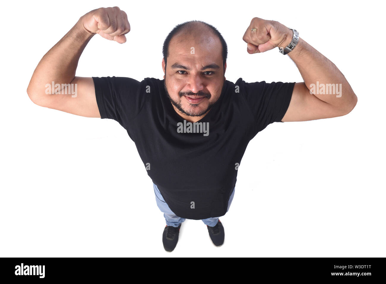 latin american man doing strength on a white background Stock Photo - Alamy