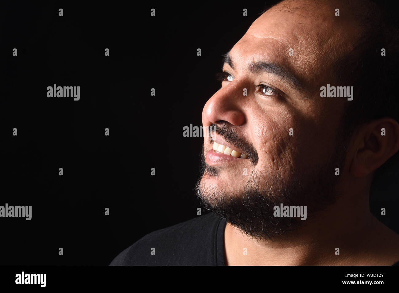 Side shot latino man hi-res stock photography and images - Alamy