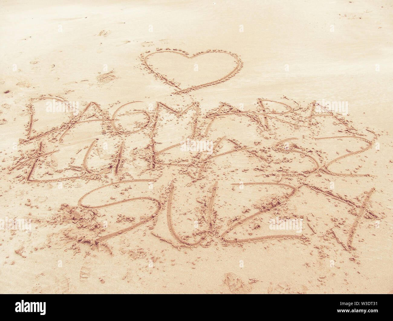 Writing on a beach - love letters on sand Stock Photo - Alamy