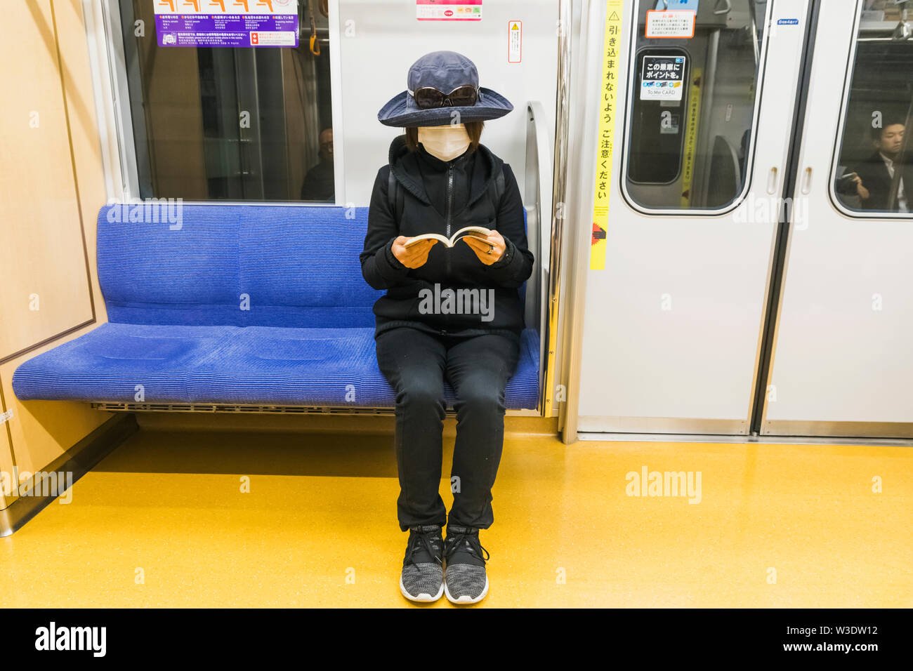 Japan, Honshu, Tokyo, Subway, Subway Female Passenger Wearing Allergy ...
