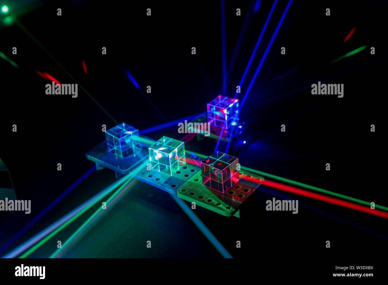 Laser beams in the laboratory of optical physics Stock Photo - Alamy