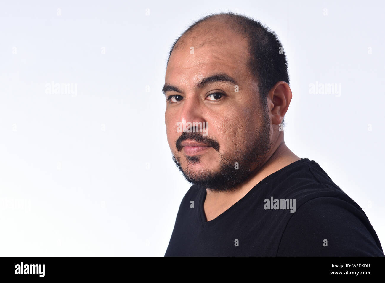 portrait of a latin american man on white background Stock Photo - Alamy