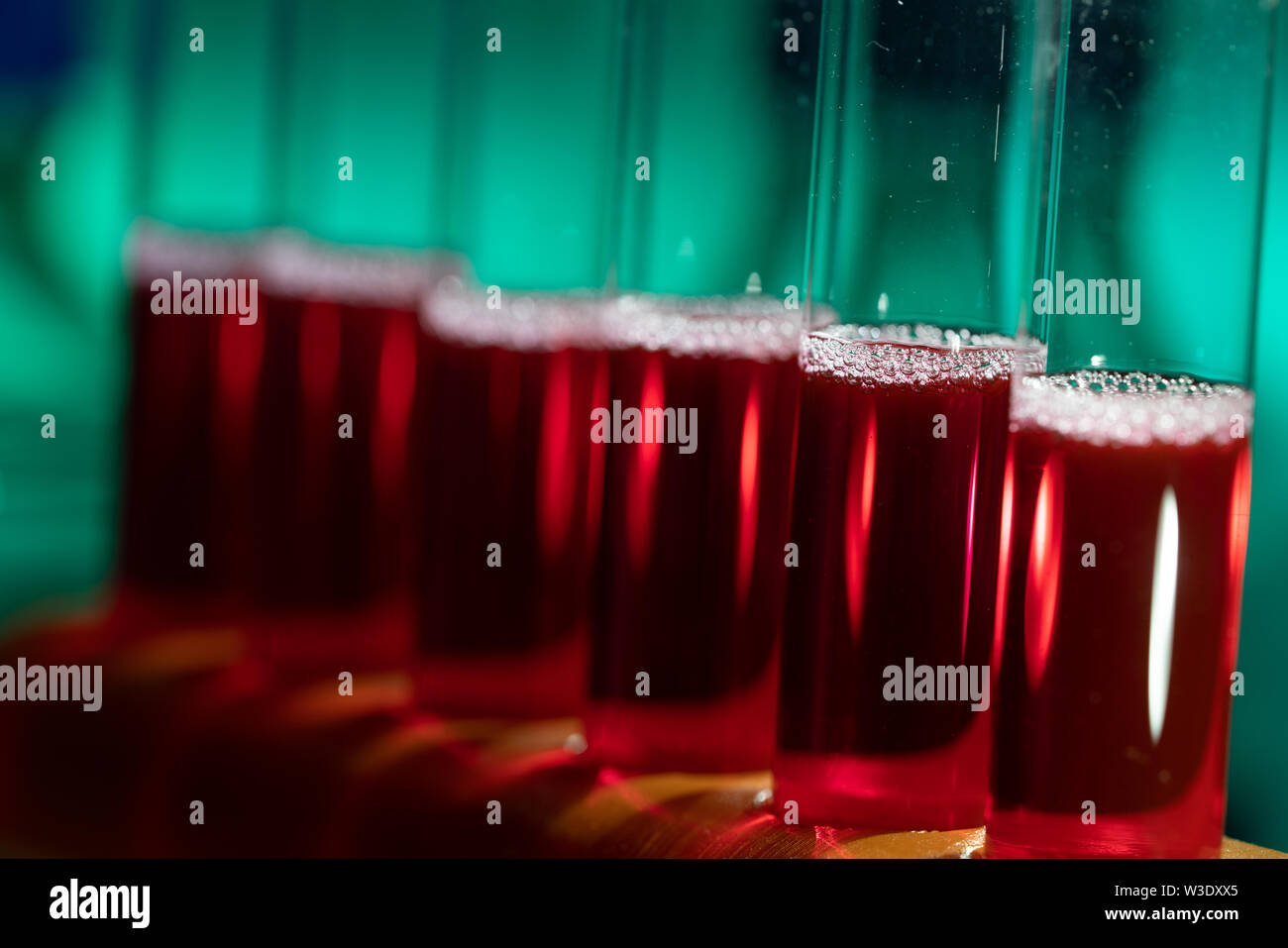Test tube in rack and pipette media dispenser Stock Photo - Alamy