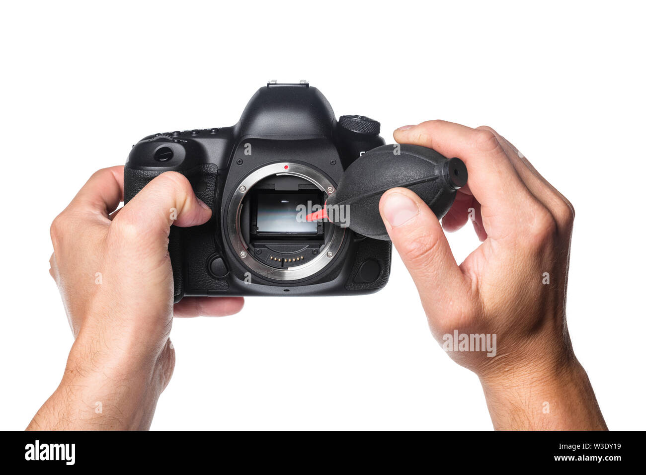 Photo camera in hand isolated on white background Stock Photo - Alamy