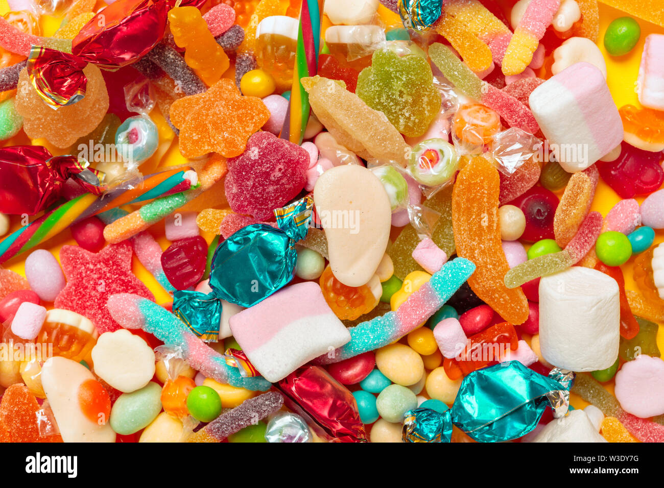 Different colorful fruit candy Stock Photo - Alamy