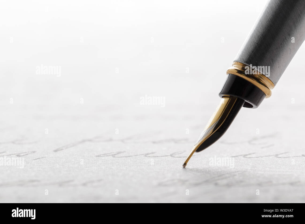 Fountain Pen on Written Page Stock Photo - Alamy