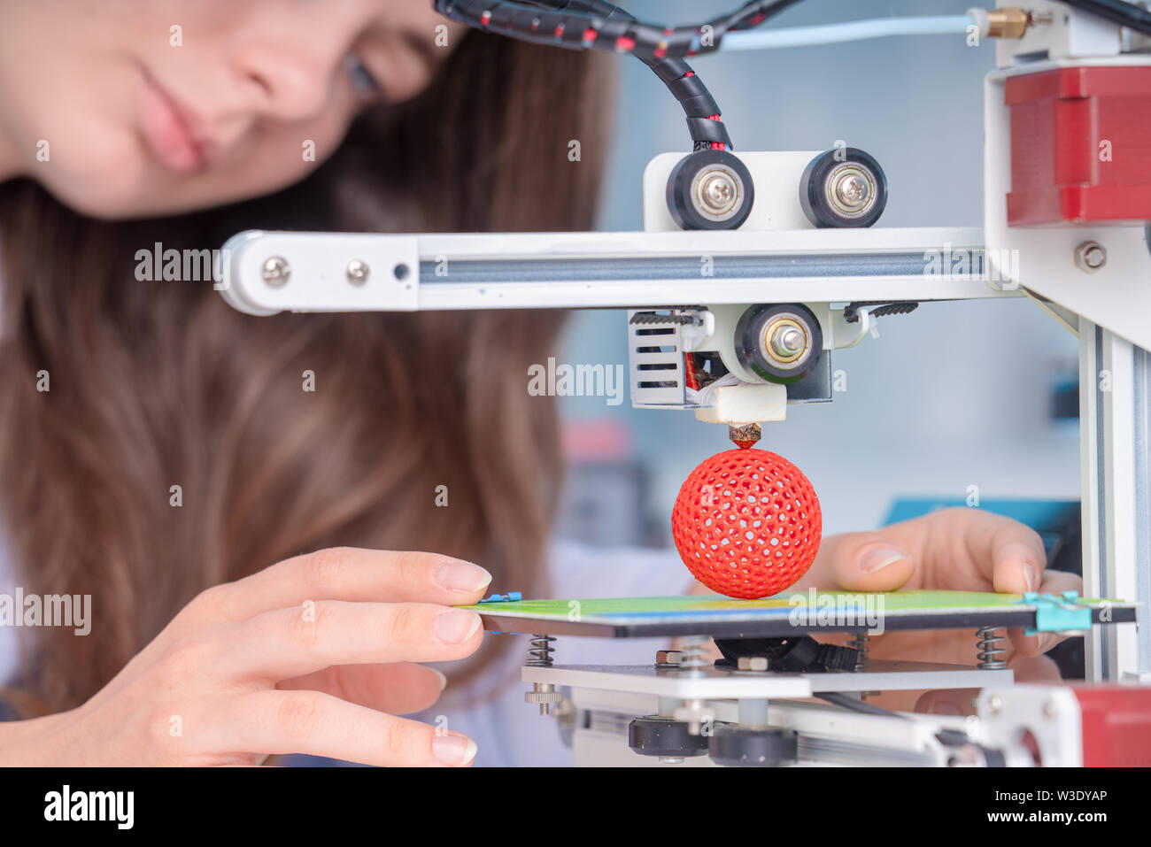 A student girl print prototype on 3D printer Stock Photo - Alamy