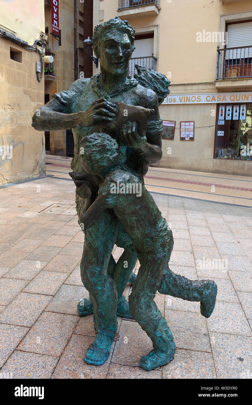 Bronzed statue of young family in the streets of Haro, La Rioja, Spain ...
