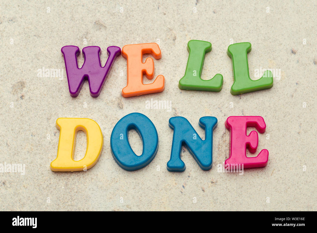 Words Well done written in colorful plastic letters close up shot Stock ...