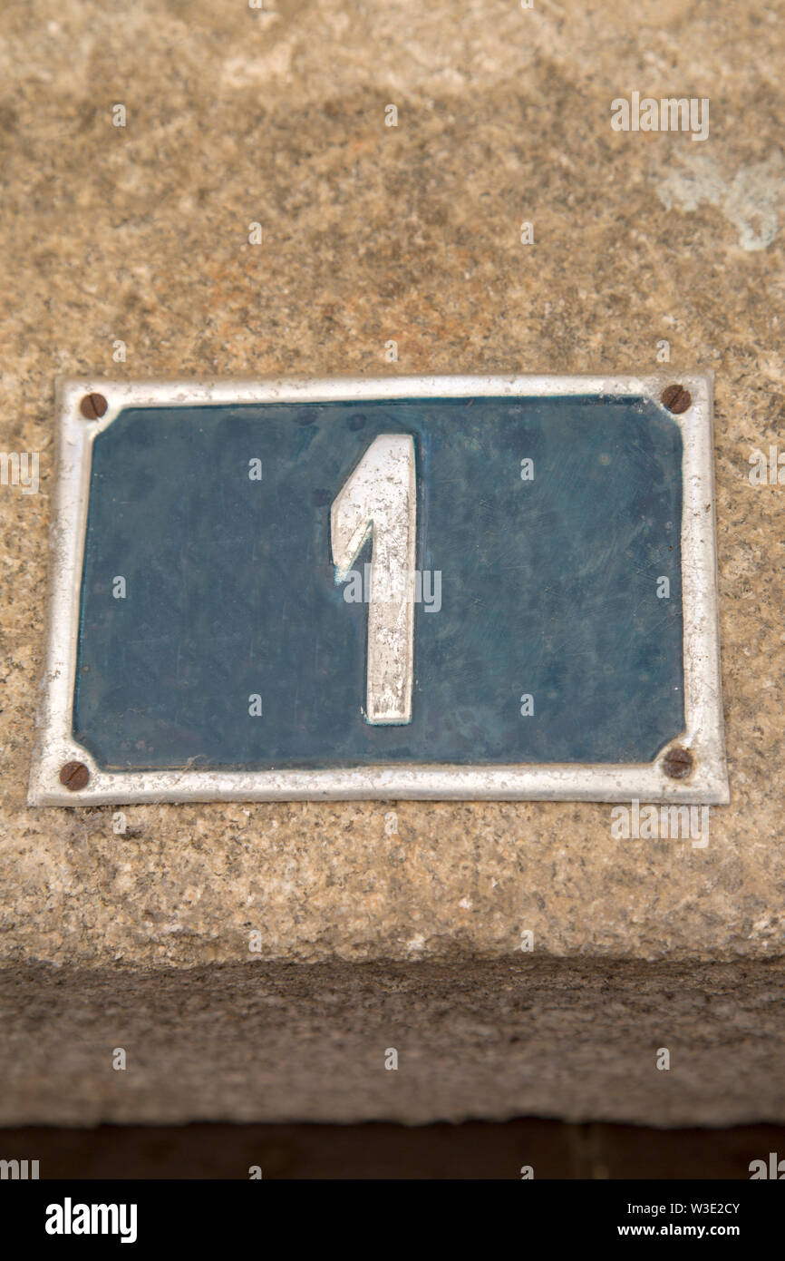 Number One on Stone Wall Stock Photo - Alamy