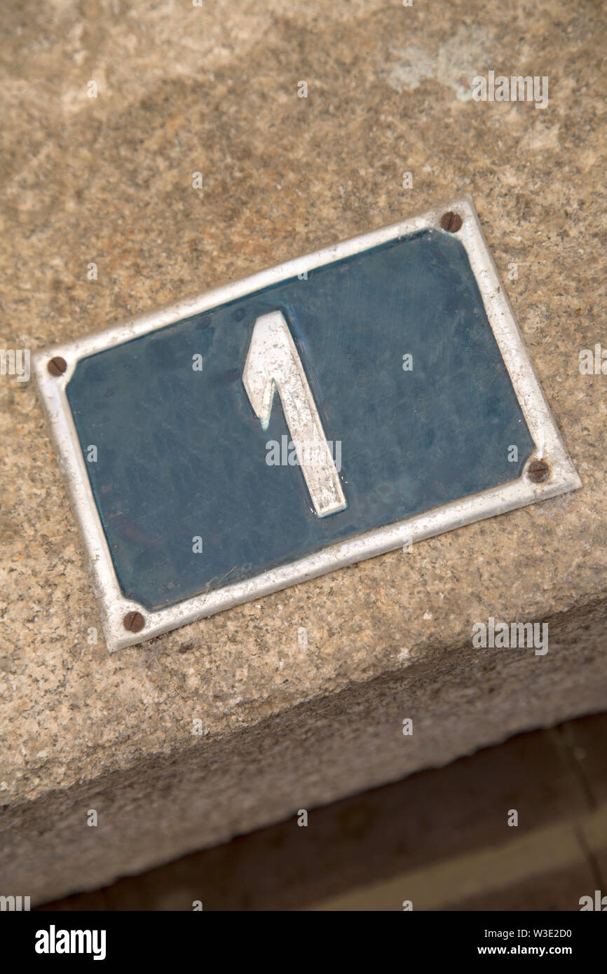 Number One on Stone Wall Stock Photo - Alamy