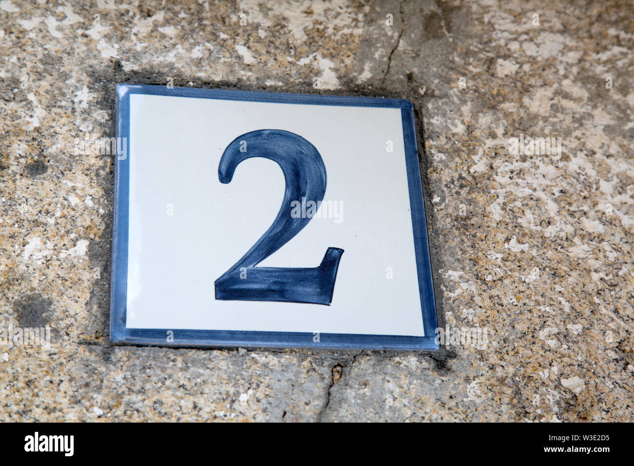 Number Two on Tile at Door Stock Photo - Alamy