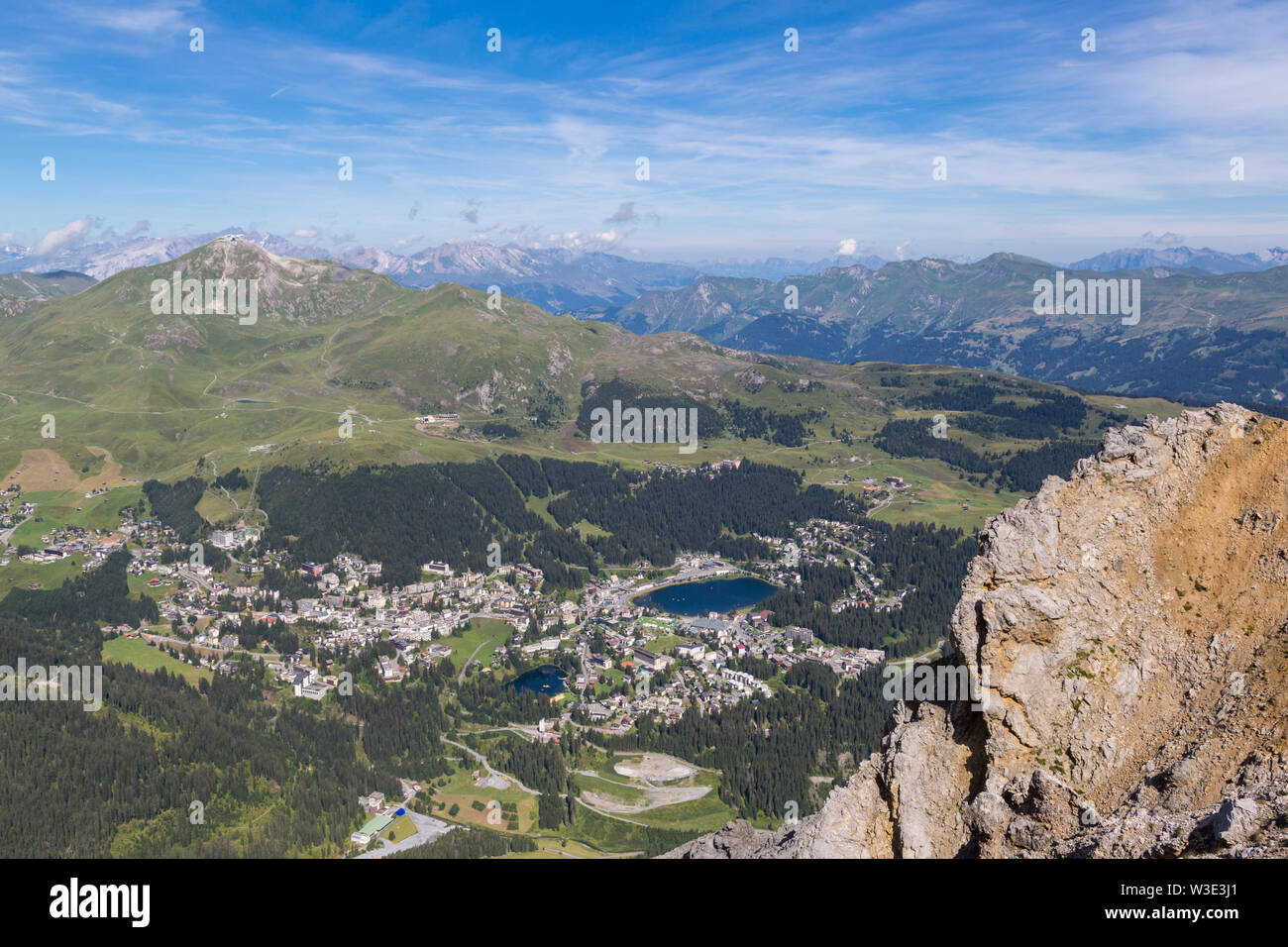 village of Arosa and surrounding mountains from above viewed in summer ...