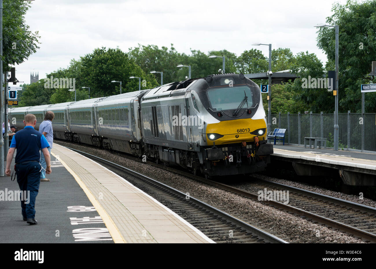 A class 68 diesel locomotive pulling a Chiltern Railways train at ...