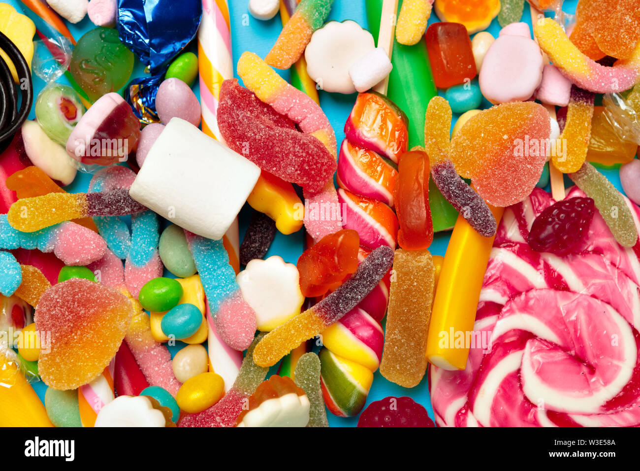 Different colorful fruit candy Stock Photo - Alamy