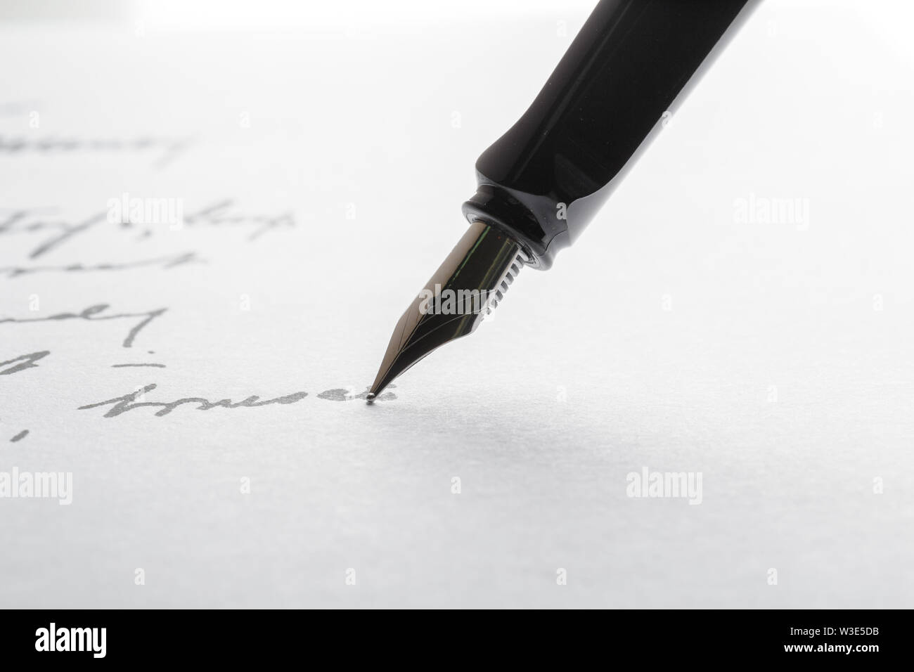 Fountain Pen on Written Page Stock Photo - Alamy