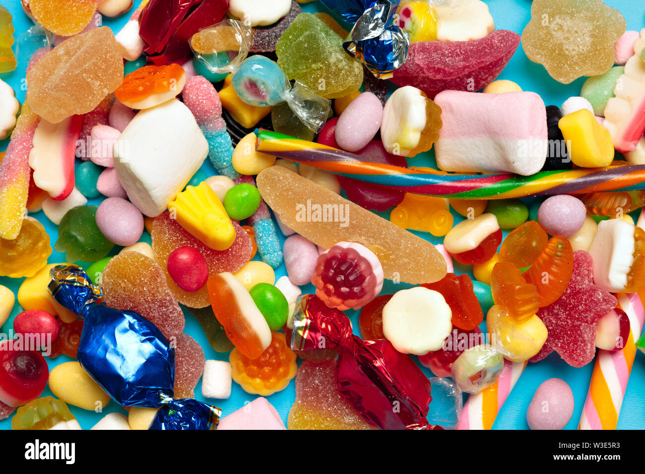 Different colorful fruit candy Stock Photo - Alamy
