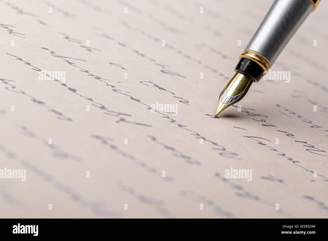 Fountain Pen on Written Page Stock Photo - Alamy