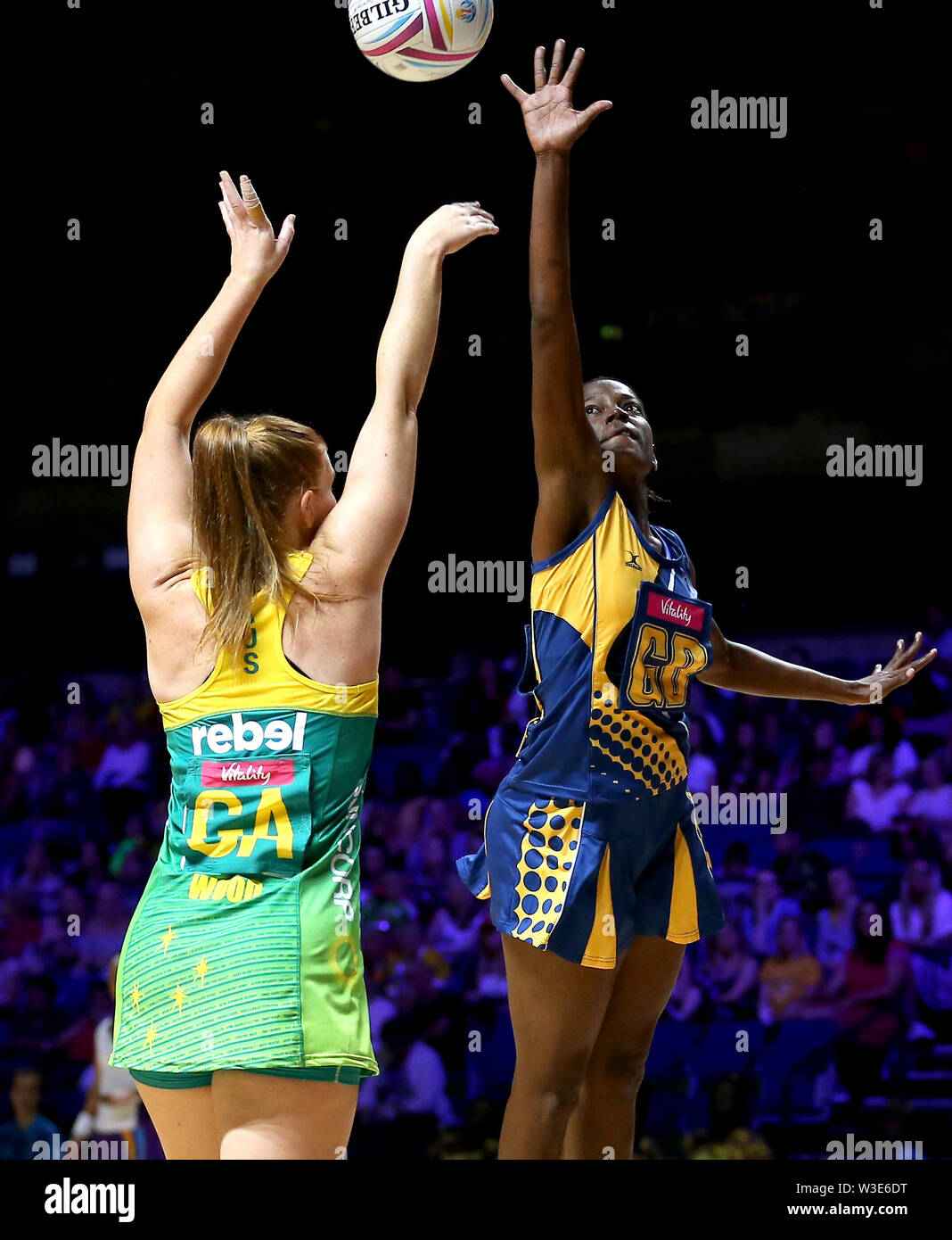 Australia's Steph Wood (left) and Barbados' Latonia Blackman in action ...